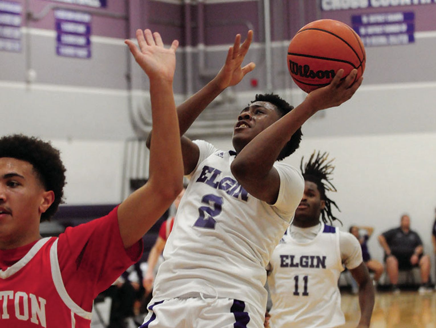 Elgin drops third district game