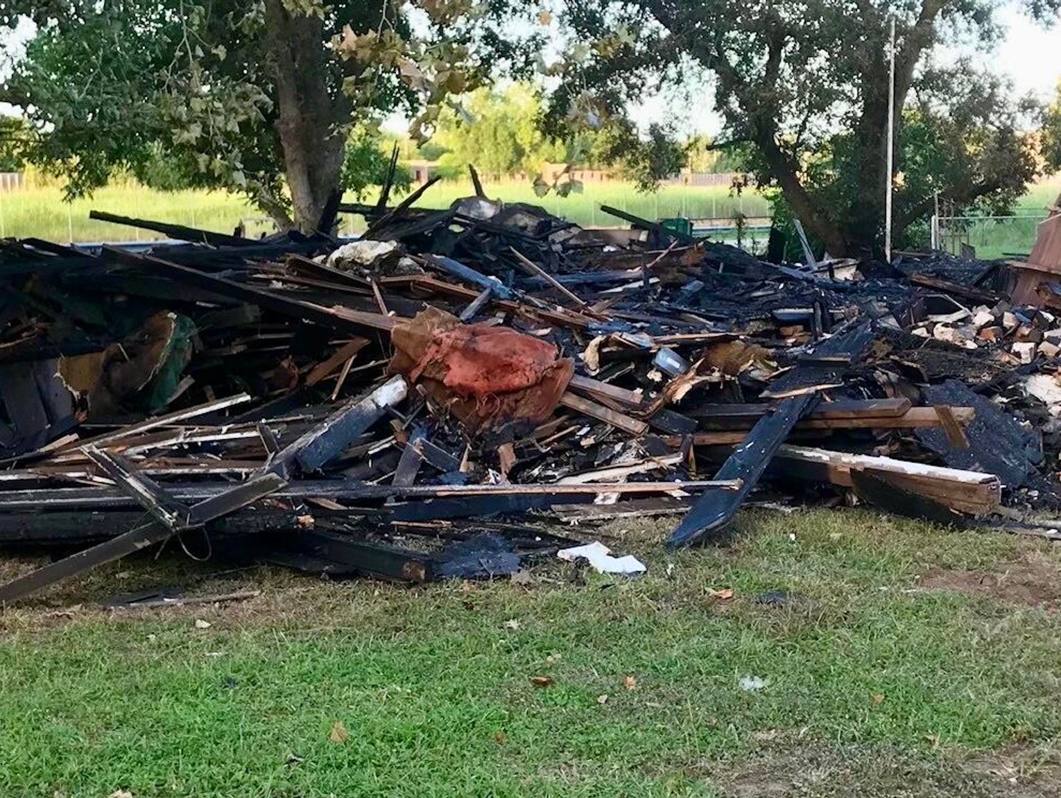 Midday fire levels Smithville home